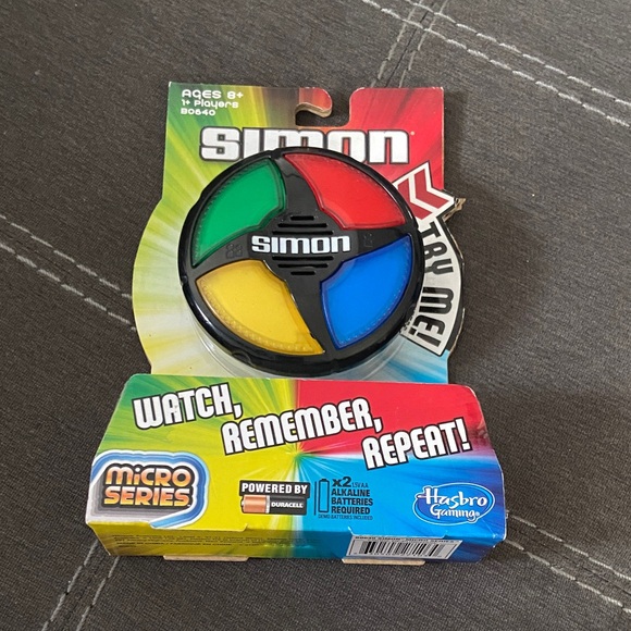 Hasbro | Games | Hasbro Simon Micro Series Game With Red Green Yellow Blue | Poshmark